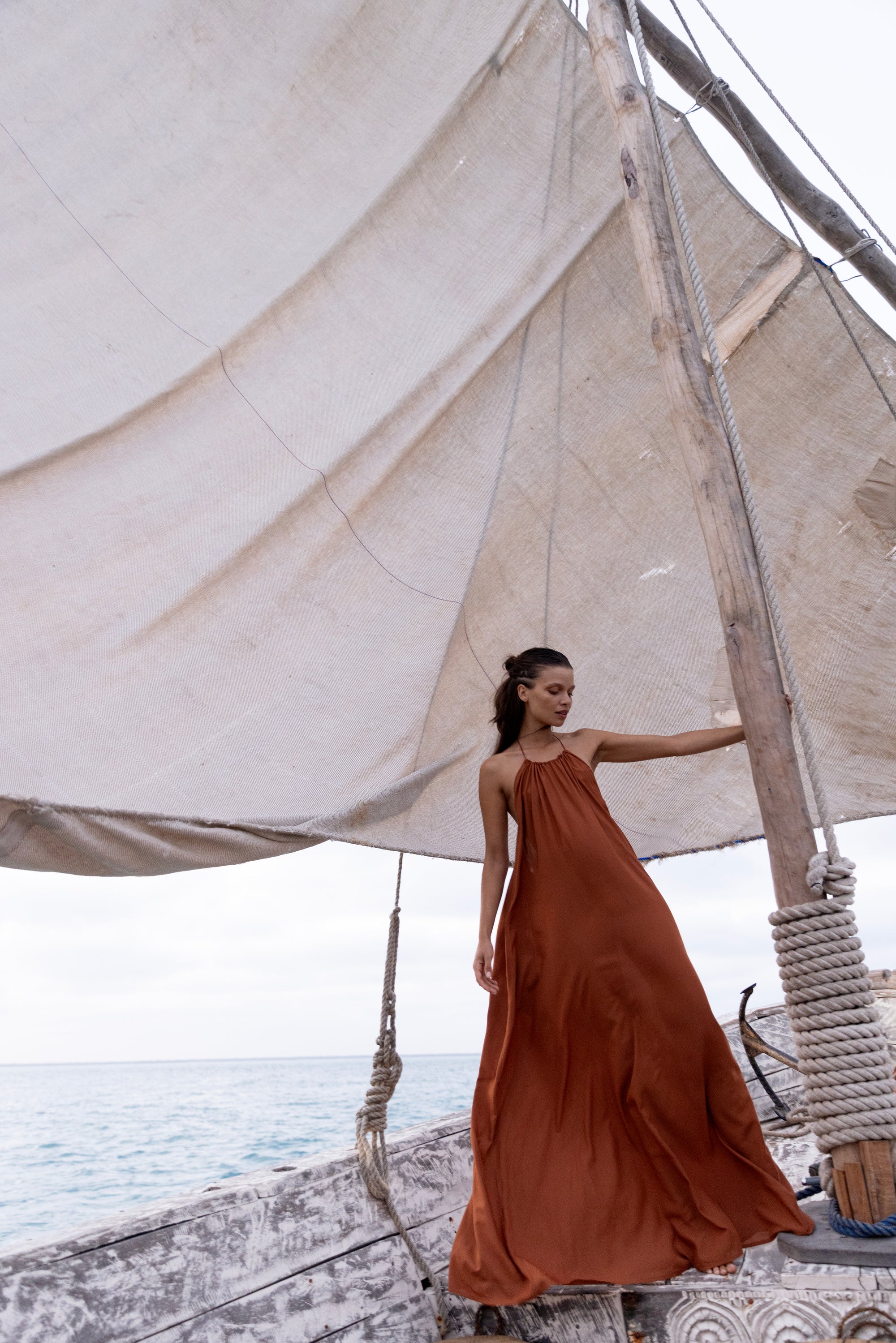 Naya Dress Cinnamon | High Neck Low Back Hemp Dress in Burnt Orange | FARA Boutique - FARABOUTIQUE