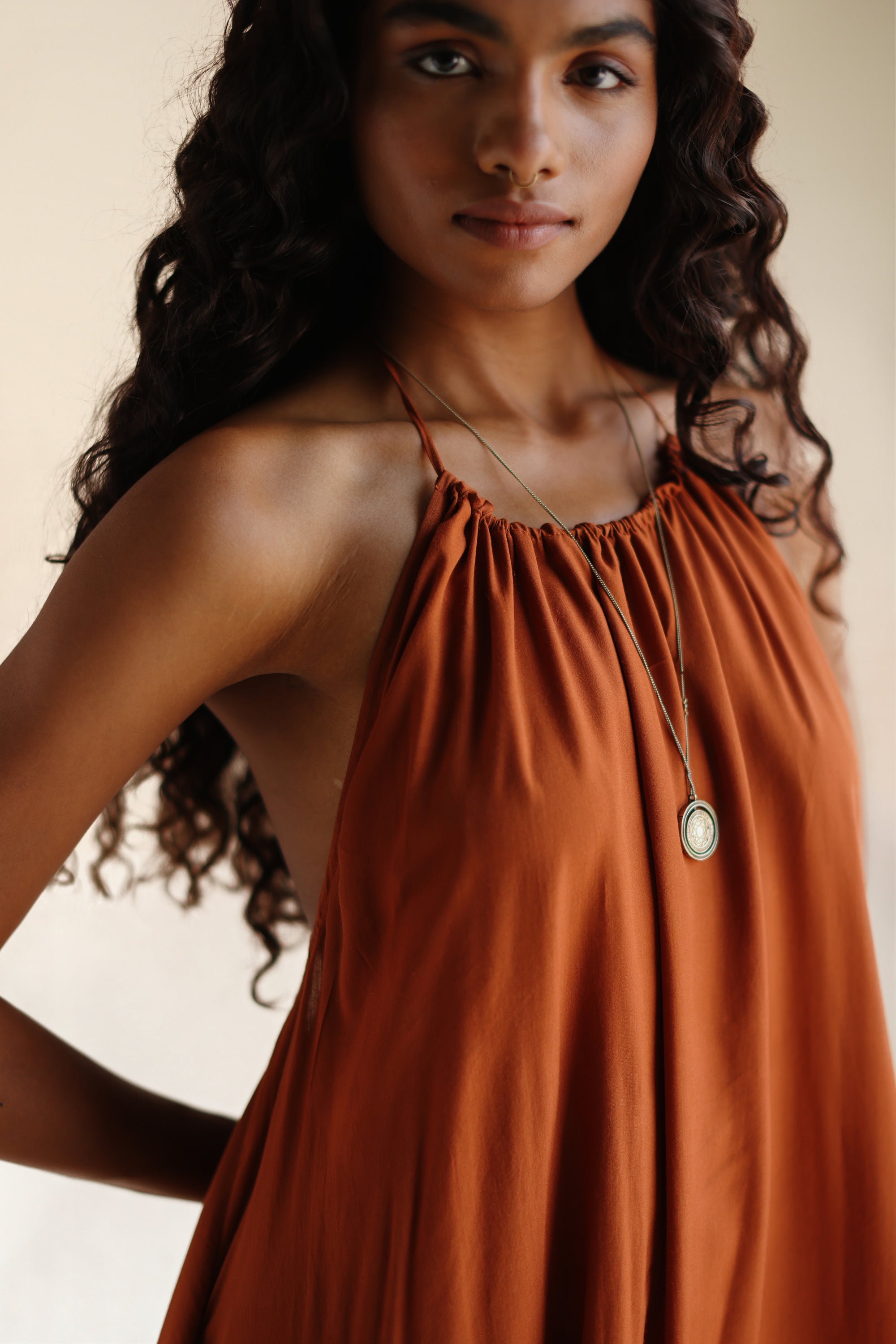 Naya Dress Cinnamon | High Neck Low Back Hemp Dress in Burnt Orange | FARA Boutique - FARABOUTIQUE